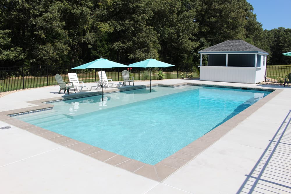 Swimming Pool with Sun Shelf | The Pool Company Construction