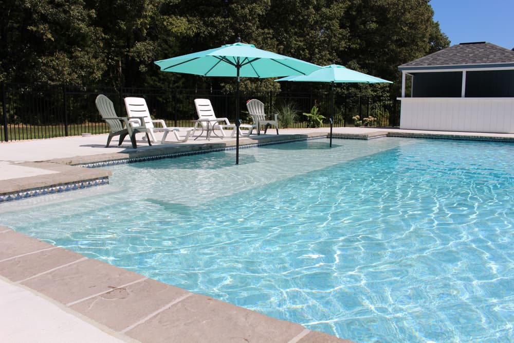 Swimming Pool with Sun Shelf | The Pool Company Construction
